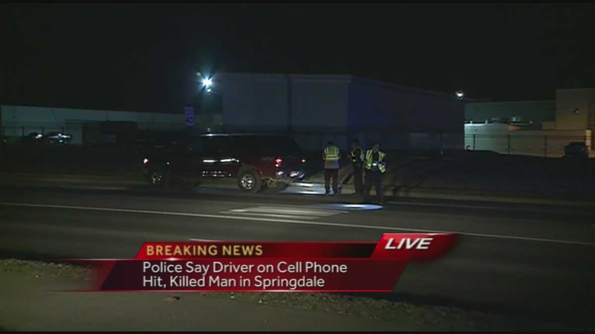 Police say driver on cell phone hit pedestrian