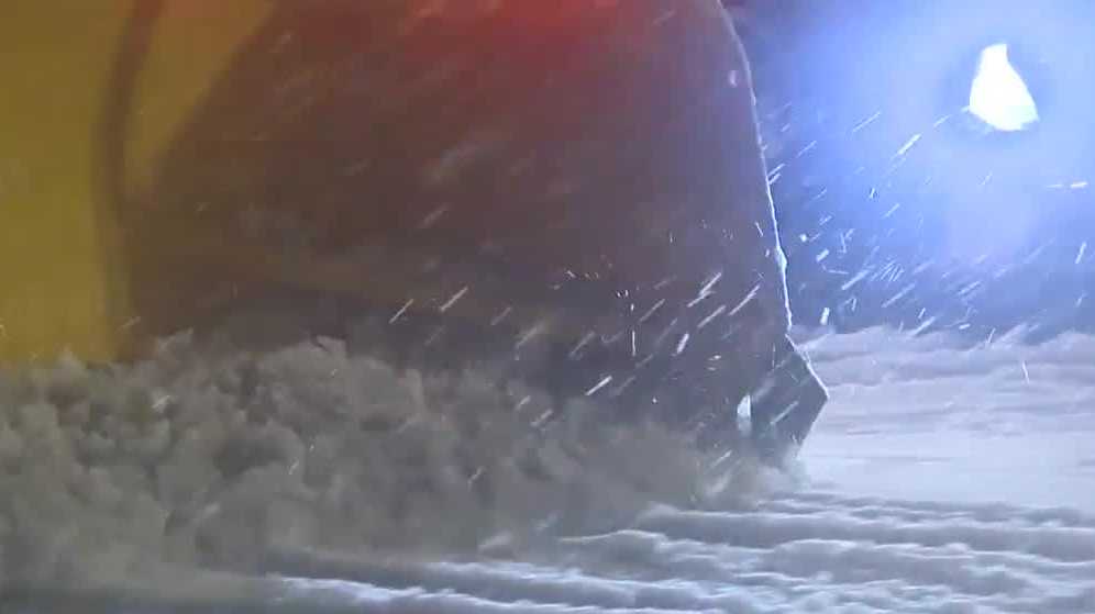 Snow plow crews work overnight to clear slushy mess