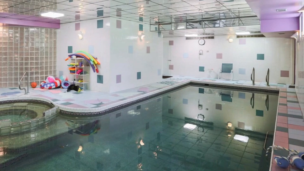 Would you live in this '90s-themed mansion?