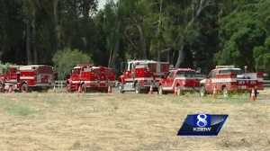 What does 'containment' mean in a wildfire?