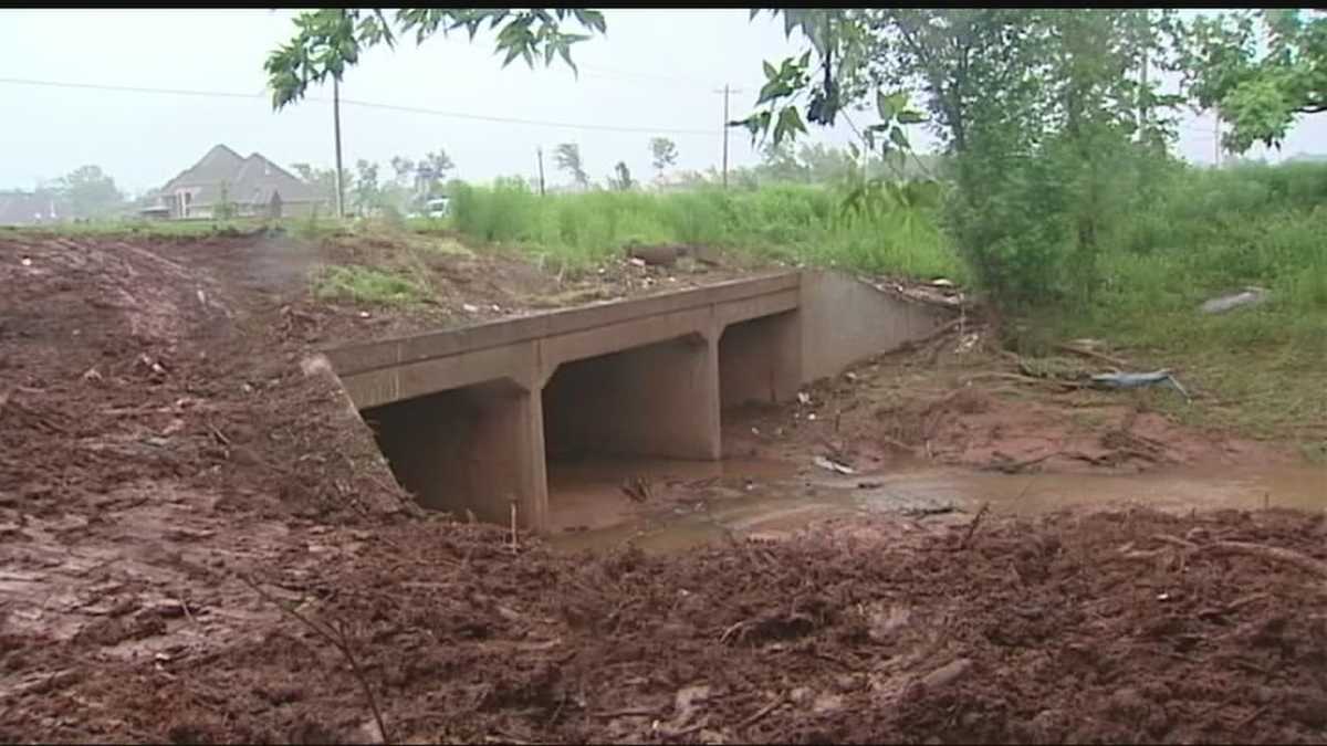 Crews clean up at Veterans Park in Moore after flooding