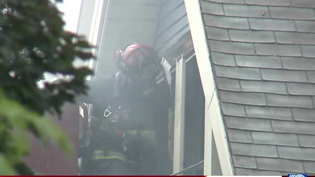 Firefighter falls through attic floor battling house fire