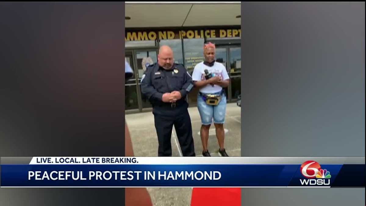 Hammond police officers give out water at peaceful protest