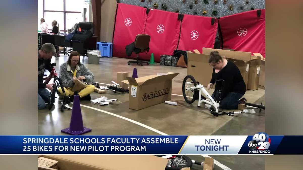 Springdale schools faculty assemble bikes for pilot project