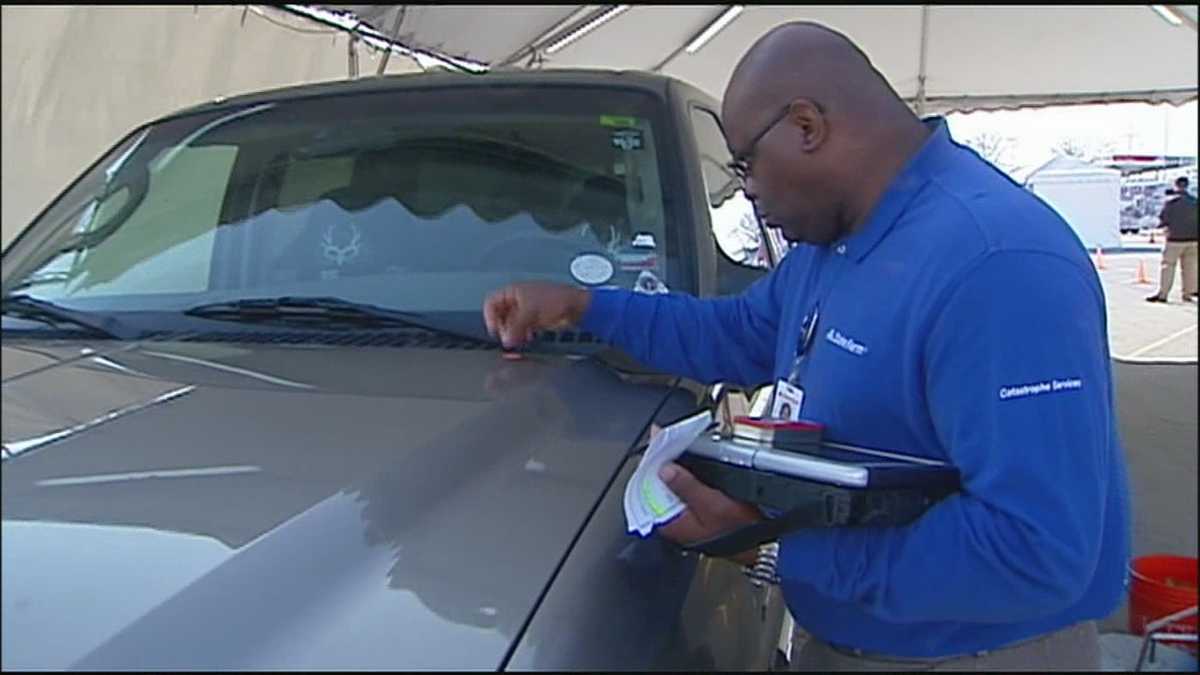 Drive-thru tent helps insurance agents keep up with hail damage