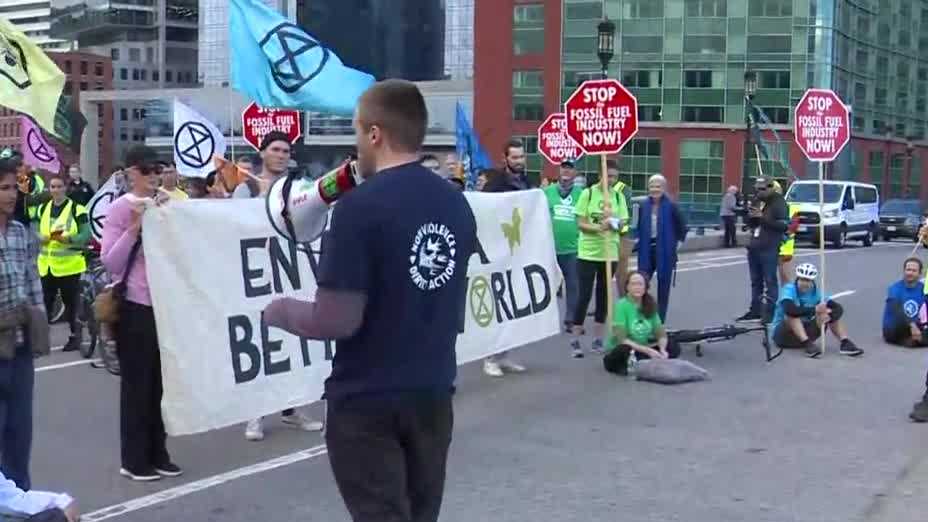 Climate change activists block busy Boston bridge