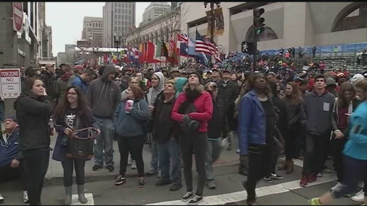 Spectators support runners in Boston Marathon