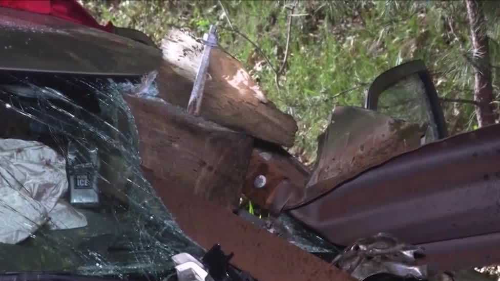 Guardrail smashes through car's windshield