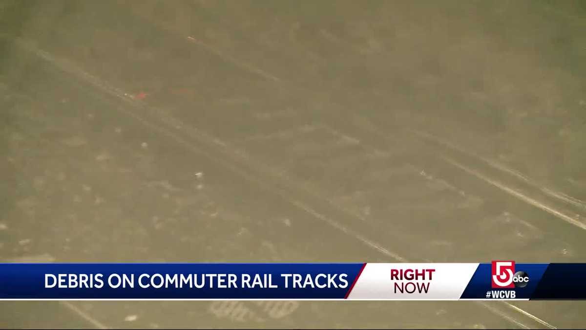 Tracks cleared after debris falls from bridge
