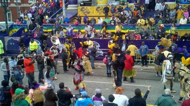 Zulu tramps dance in the street Mardi Gras morning