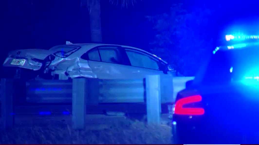 Car crashes through guard rail on I-75 and Corkscrew Road