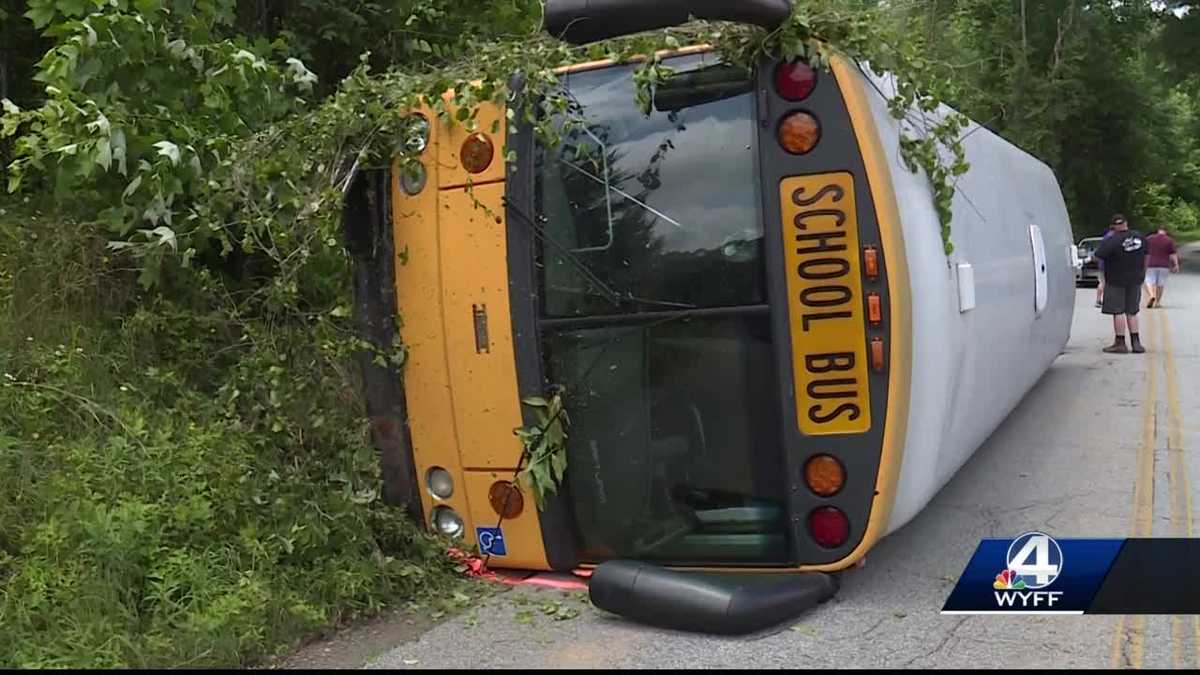 School bus carrying students flips over in Pickens County