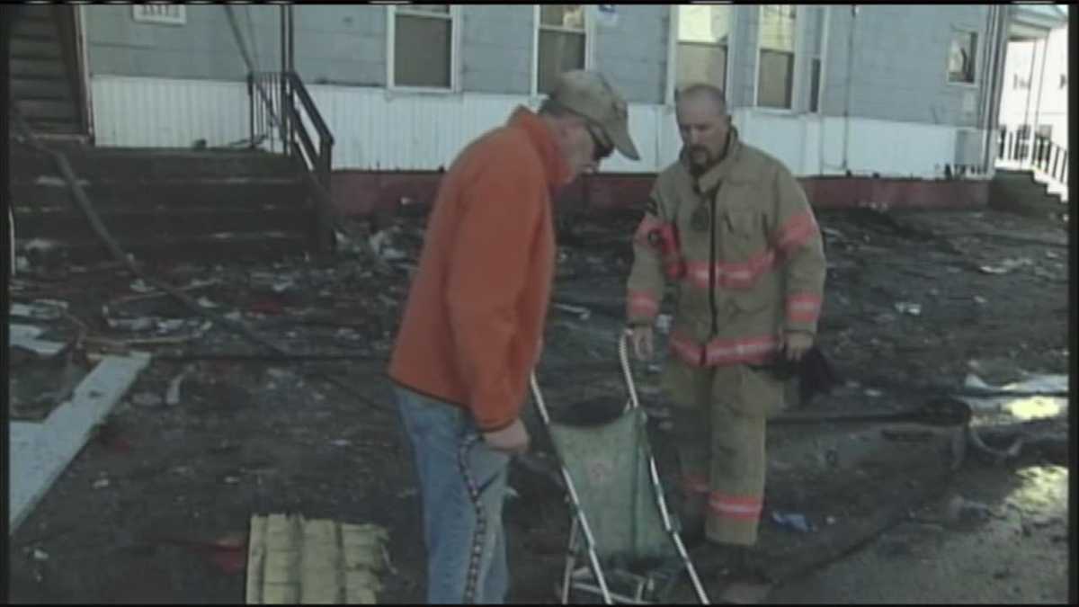 Residents try to salvage belongings following Lewiston fire