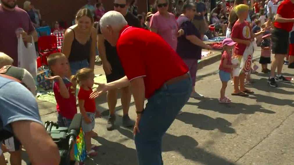 Former Vice President Mike Pence walks in Fourth of July parade in Iowa