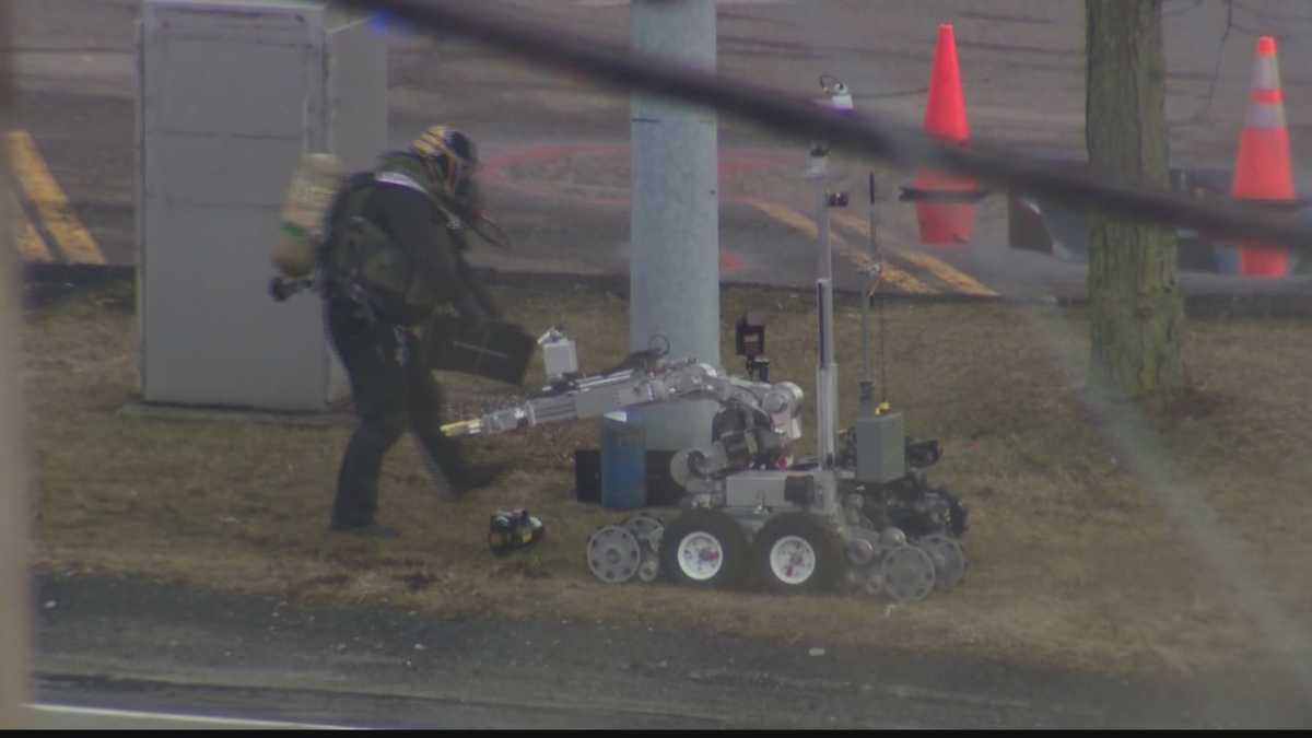 Suspicious, leaking gas tanks shut down busy intersection