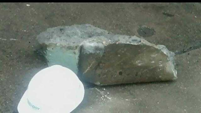 Concrete chunks fall from bridge, crash onto sidewalk