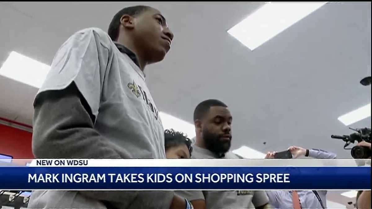 Mark Ingram heads to Target for special Christmas shopping spree with kids