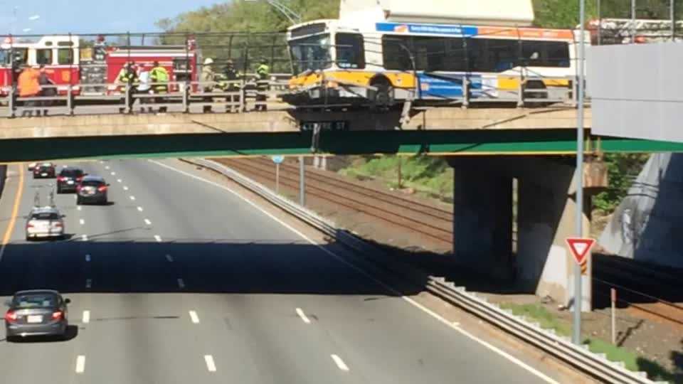 MBTA bus hangs over Pike after crash