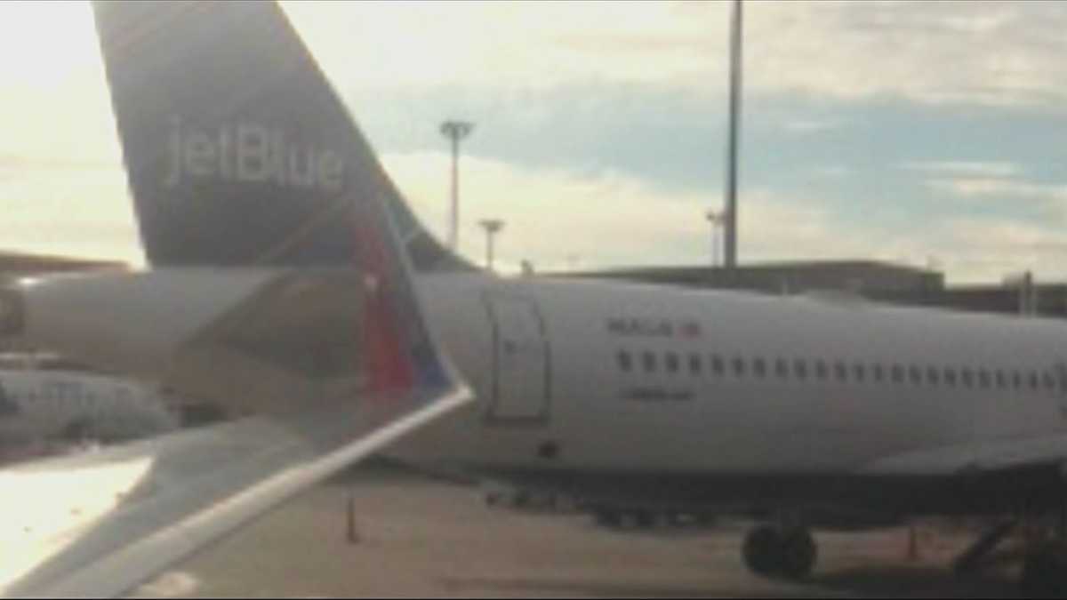 Jet clipped at Logan