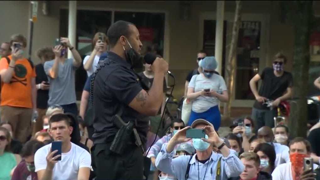 Pittsburgh police officer speaks to protesters in Market Square