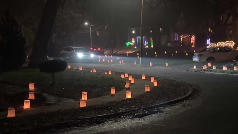 Des Moines neighborhood lights up with Christmas Eve luminaries