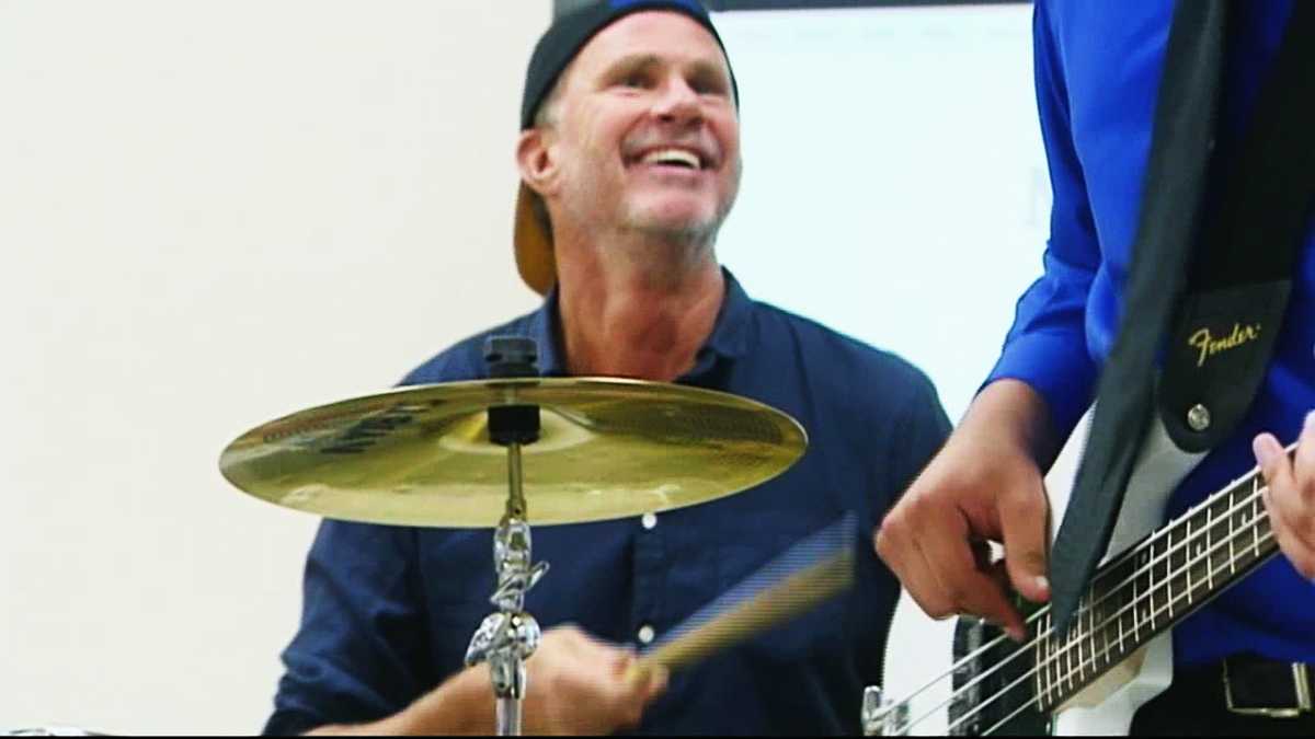 Drummer Chad Smith rocks out with Greenfield school