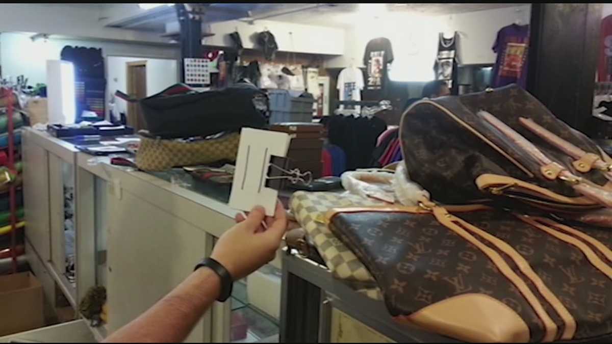 Man charged after thousands of bootleg DVDs, counterfeit purses found ...