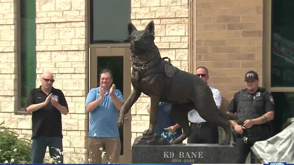 St. Francis community unveils statue to honor K9 Bane who battles ...