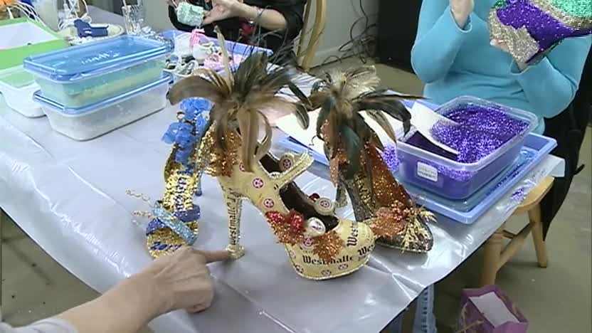 Watch what goes into a day of decorating shoes for the Muses parade!