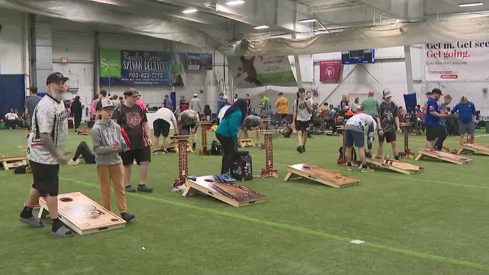 Hundreds participate in cornhole tournament in Bedford
