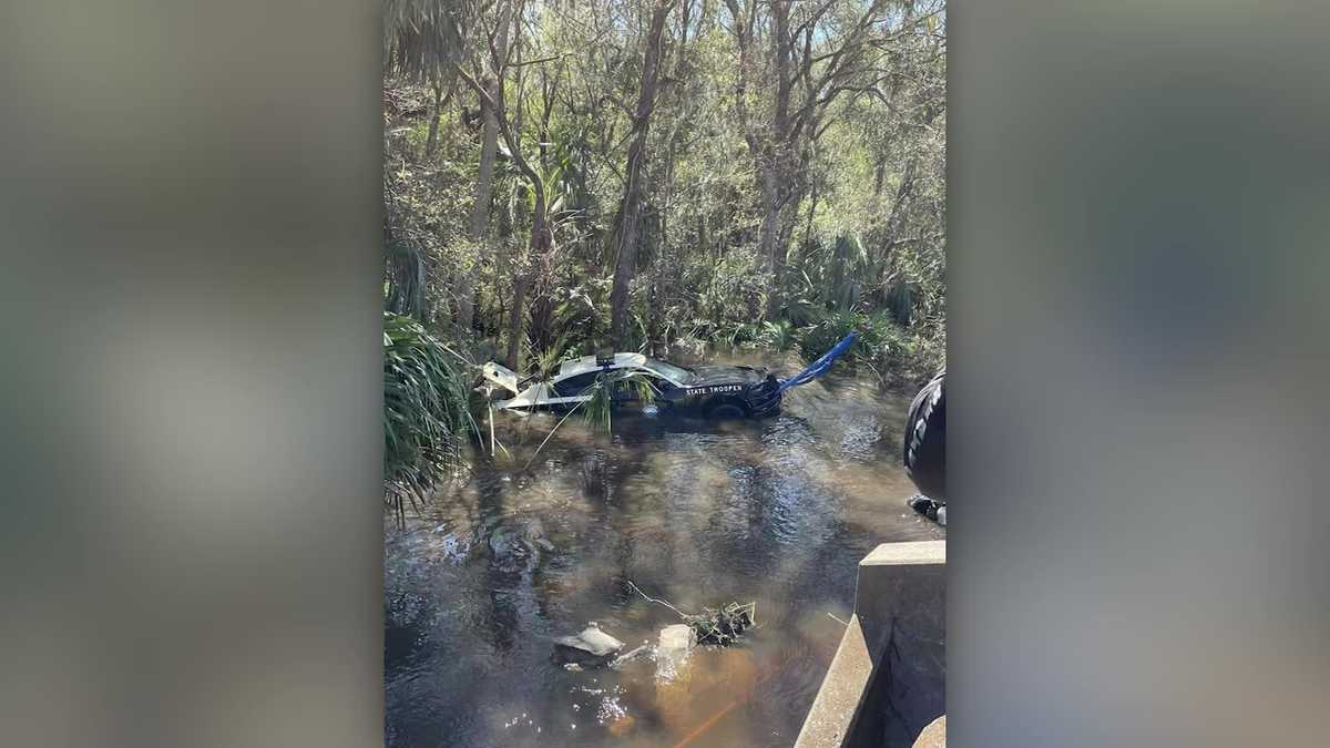 Florida State Highway Patrol vehicle pulled from flood waters