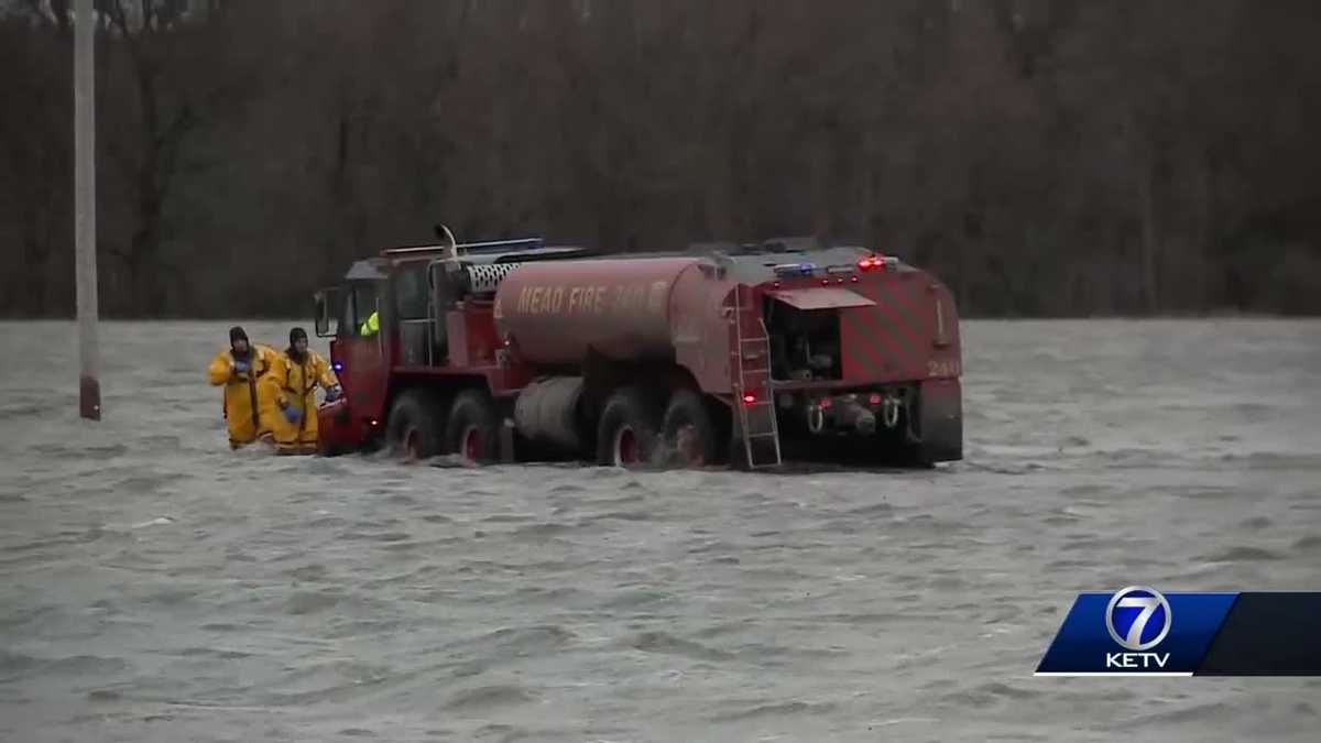 Rescuer needs rescuing during attempt to save stranded residents near ...
