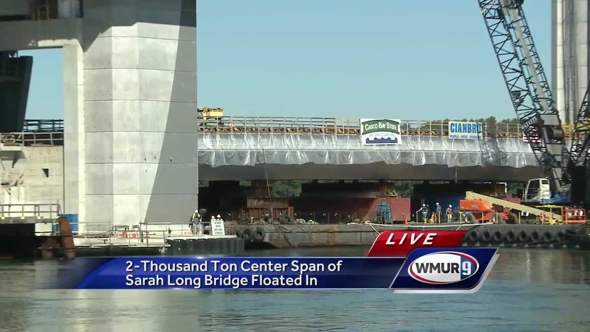 Center span floated into place for new Sarah Long Bridge
