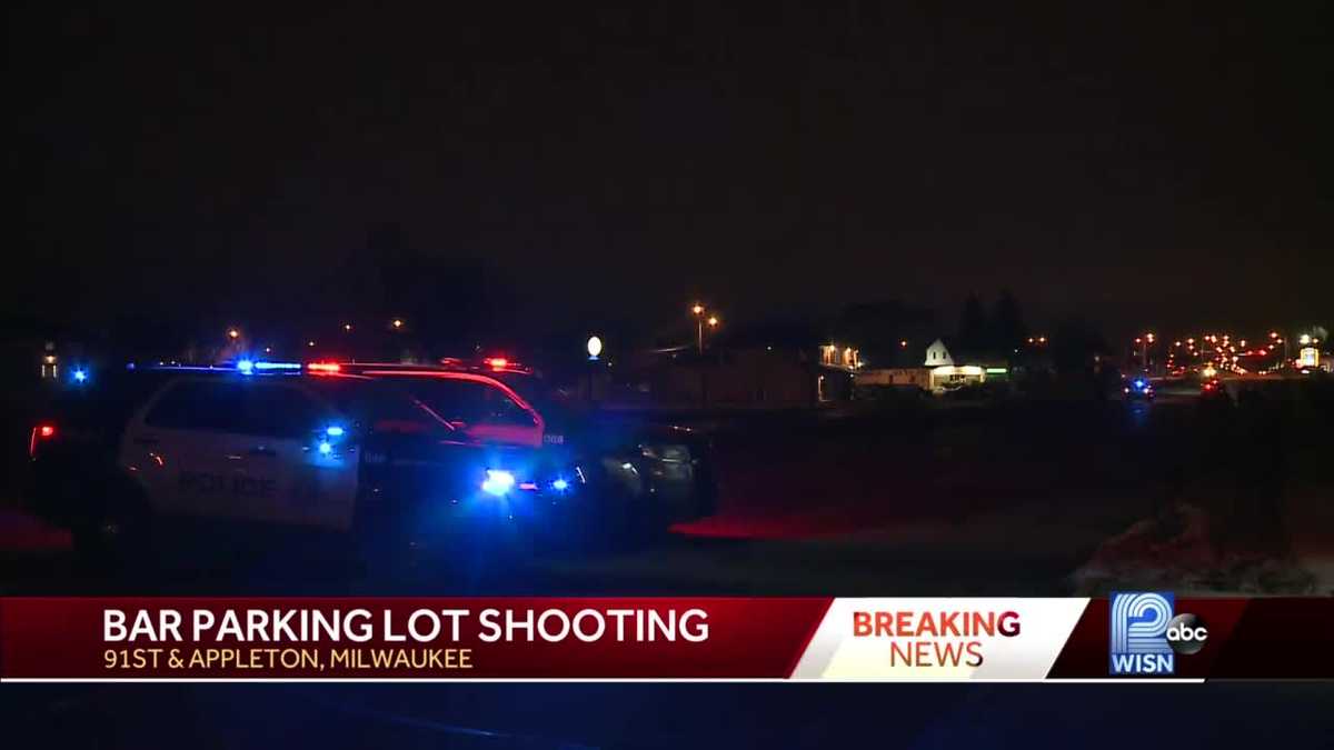 Police: 2 men hurt in shooting, beating in bar parking lot
