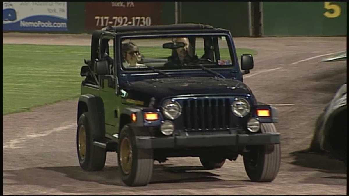 Wolf celebrates Primary victory in trademark Jeep