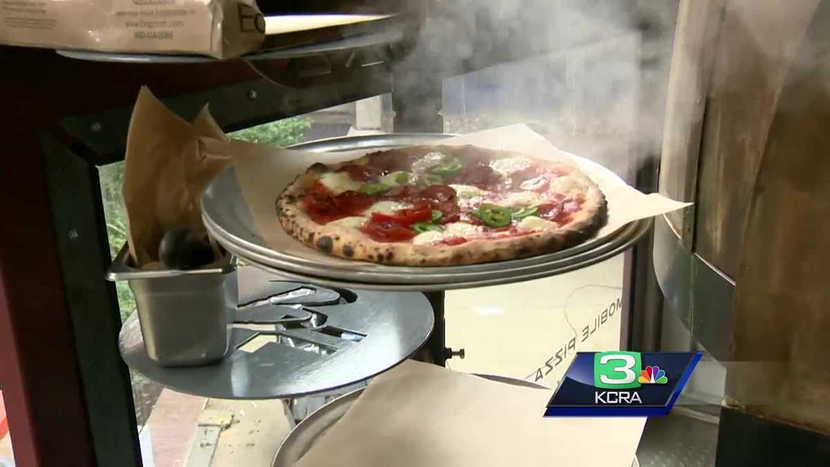 Shipping container transformed into pizza kitchen good truck