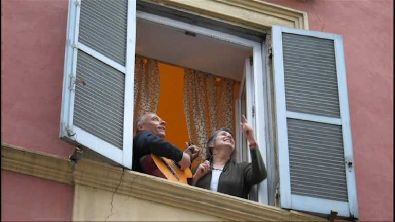 Confined to their homes during outbreak, Italian neighbors sing from ...