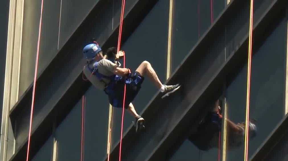 Fundraising event sends people down side of Brady Sullivan Tower