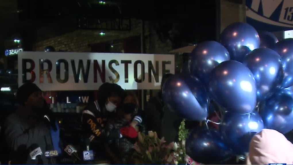 Crowd honors Brownstone shooting victim at vigil