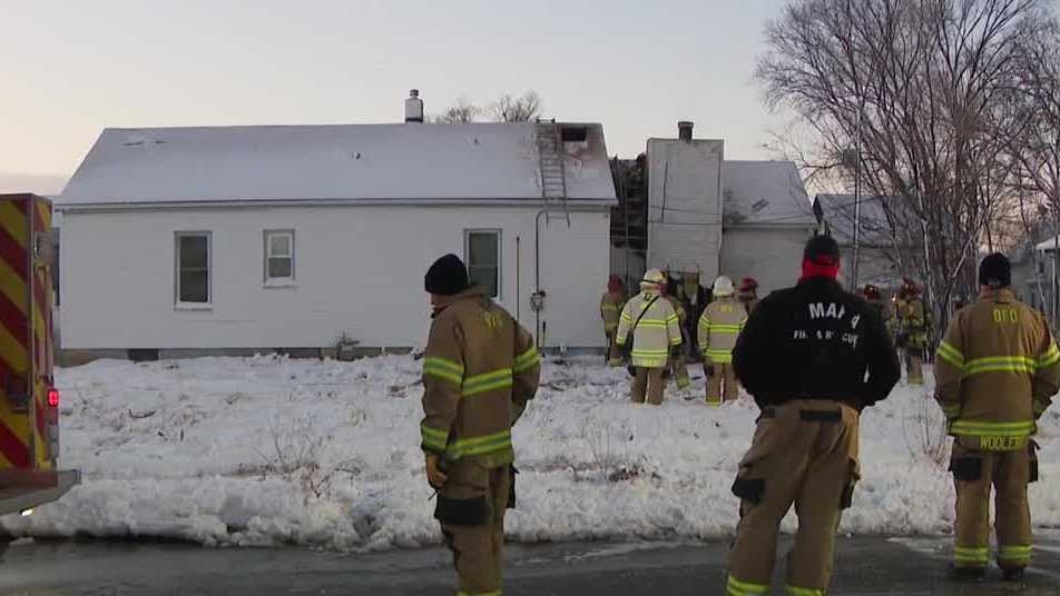 Omaha firefighters battle house fire Wednesday morning