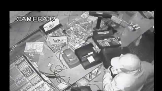 Surveillance camera captures thief in action