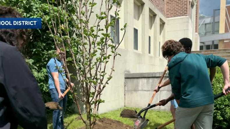 Central High students help plant trees at Manchester ceremony