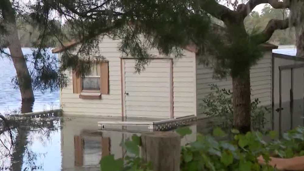 County leaders build temporary path over flooded Orange City road