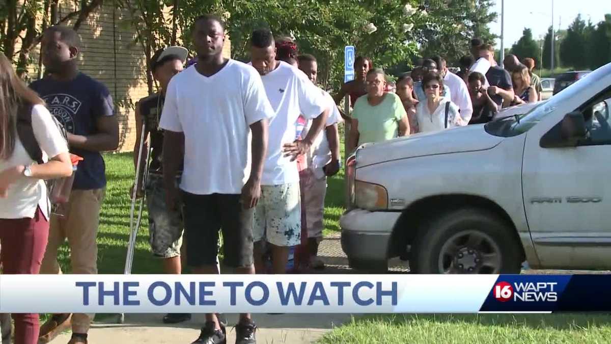 Frustrated customers wait in long line at DMV Frustrated customers wait in long line at DMV