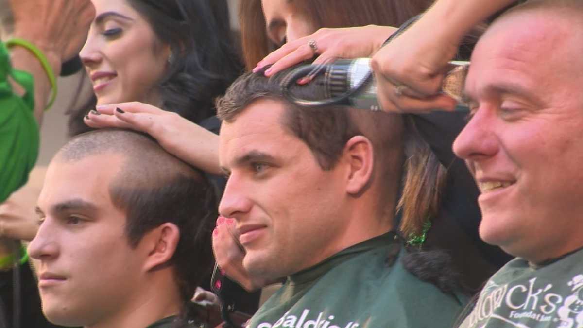 More than 300 people shave their heads for cancer research