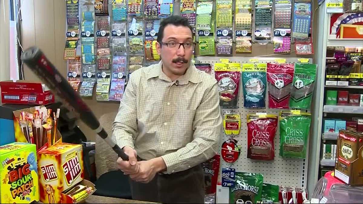Store Owner Fights Off Masked Robber With Bat
