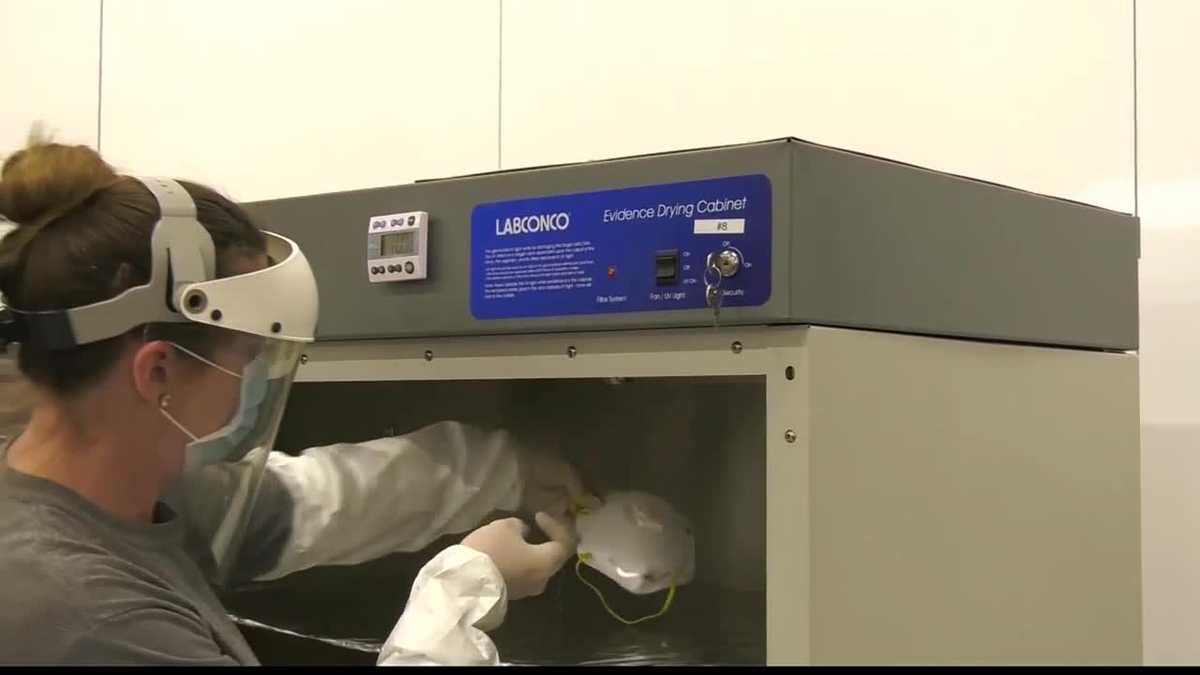 Johnson County Sheriff's Office crime lab sanitizing face masks