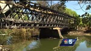 Investigators seek clues in covered bridge fire