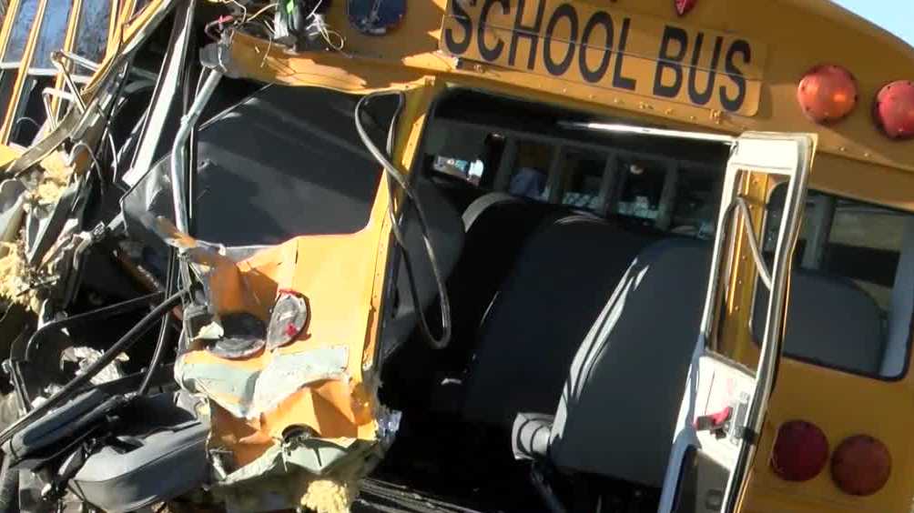 Truck slams into school bus, 10 taken to hospital