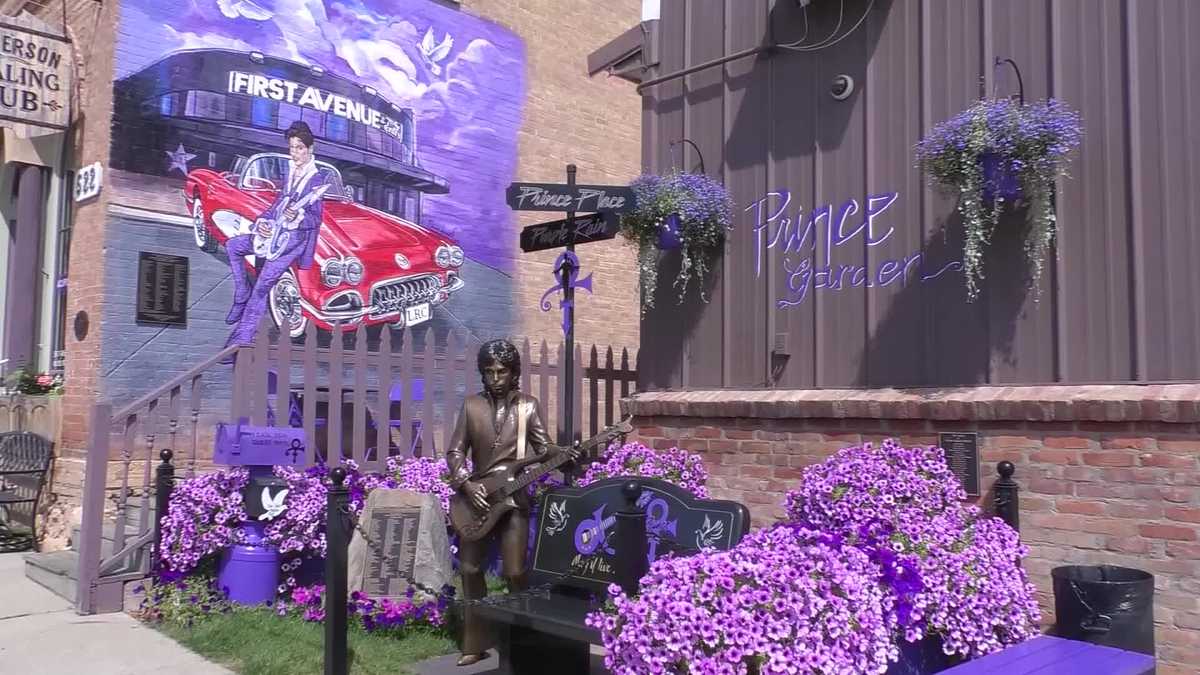 A town made famous by 'Purple Rain' unveils a life-sized statue of Prince